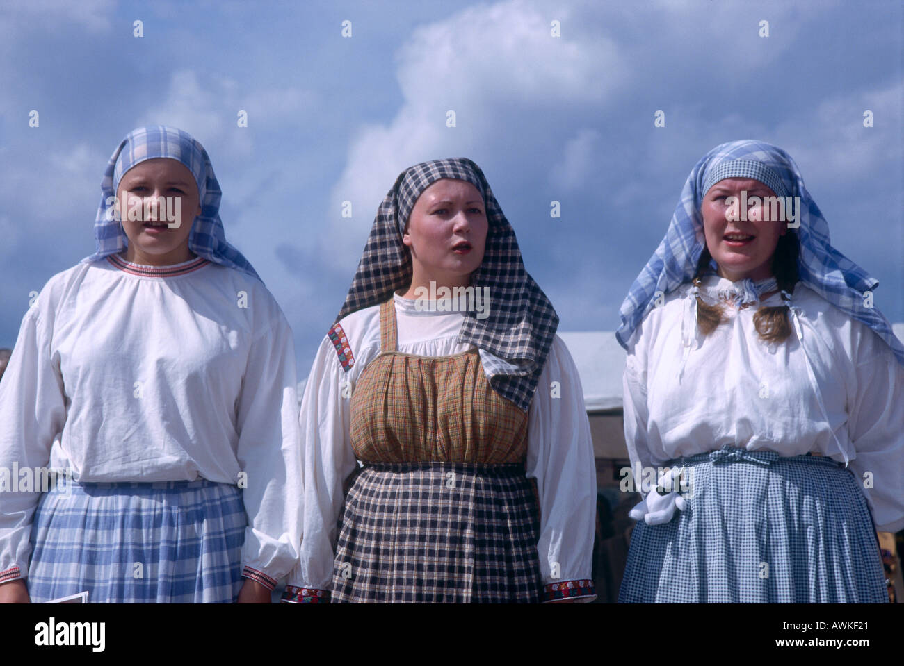 Three women wearing traditional dresses Finland Stock Photo - Alamy
