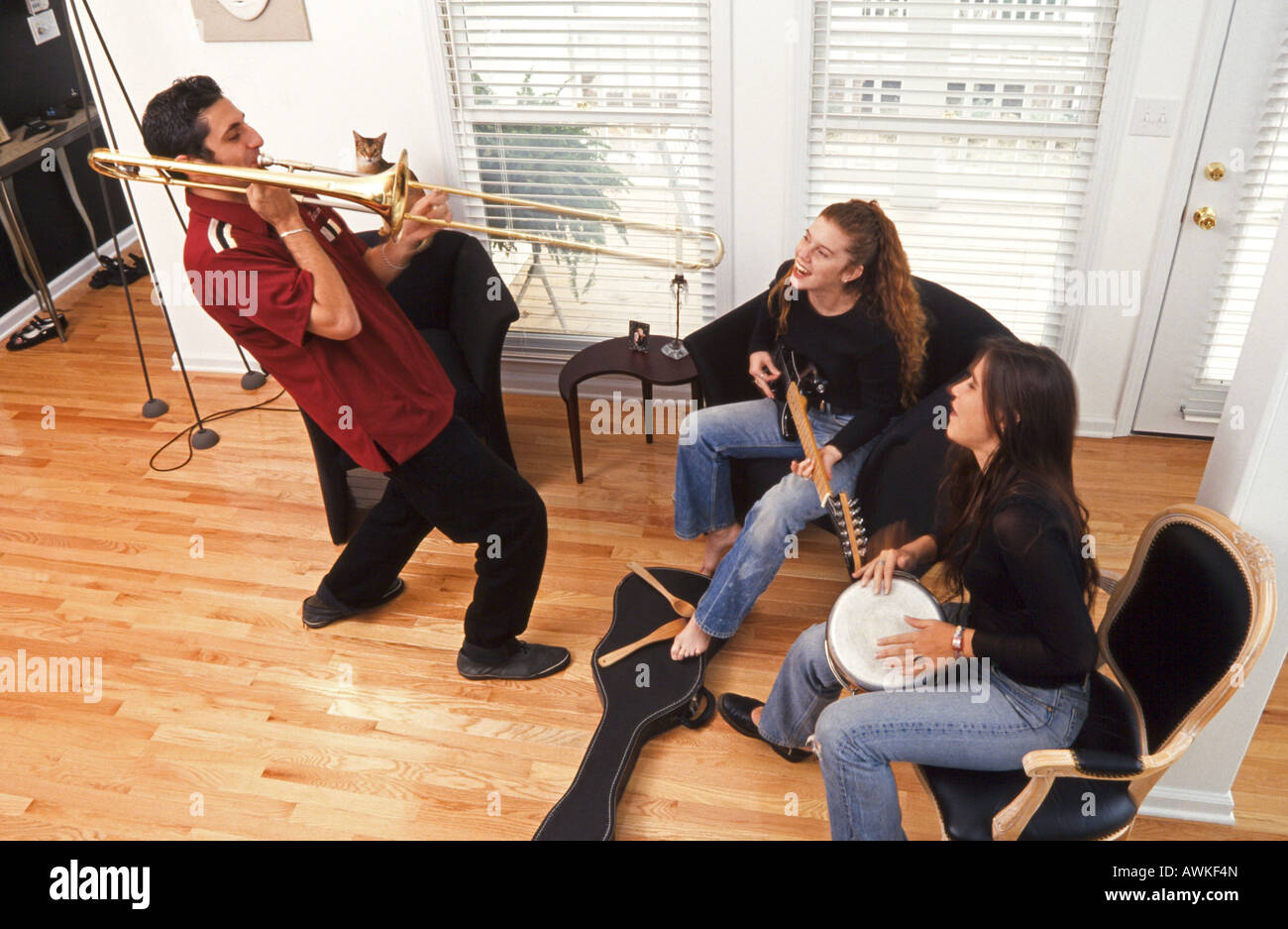 Couples playing together, musical instruments Stock Photo - Alamy