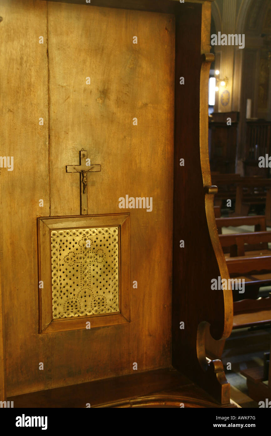 Man in church confession box hi-res stock photography and images - Alamy