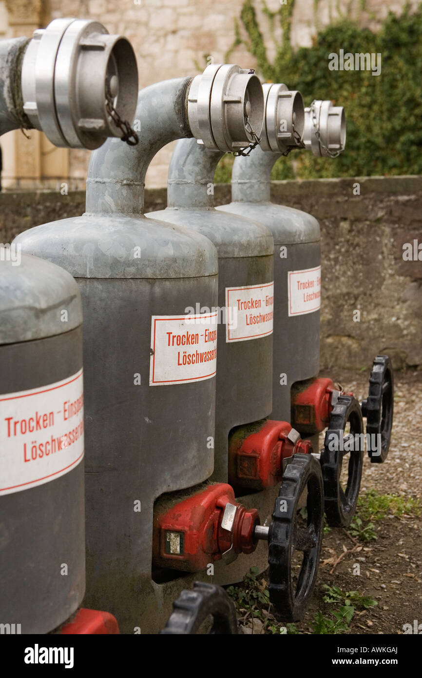 Fire hydrants in a line Tuebingen Baden Wuerttemberg Germany April 2007 ...