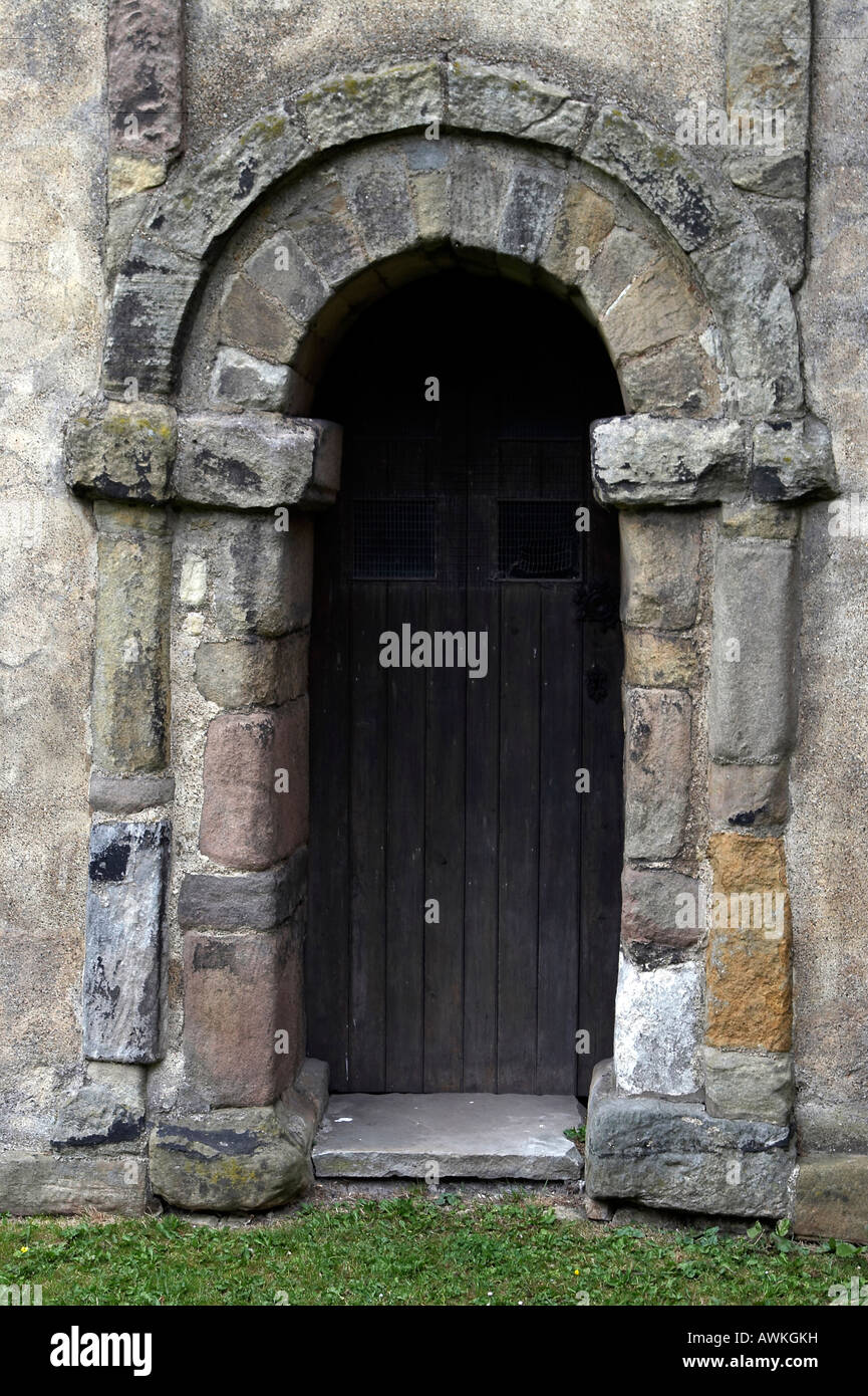 Norman door in the tower at St Peter s Church at Barton on Humber Stock ...