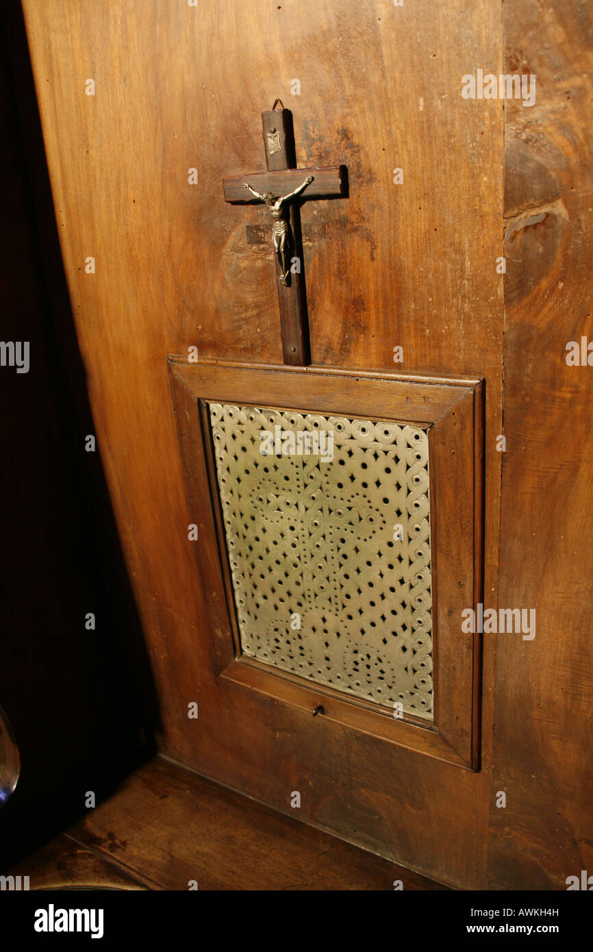 Man in church confession box hi-res stock photography and images - Alamy