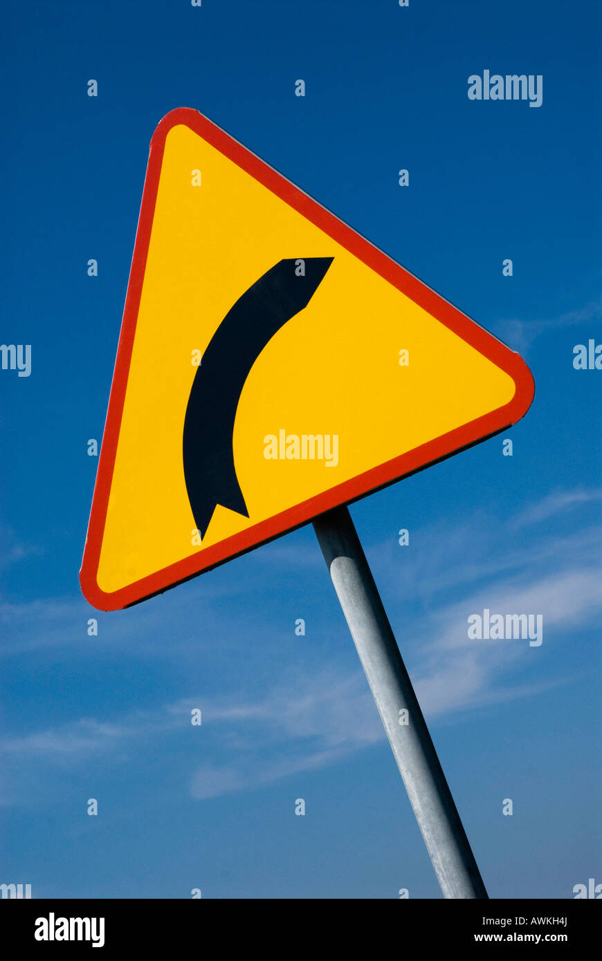 TRAFFIC SIGN. TRIANGULAR RED ROAD TRAFFIC SIGN RIGHT CURVE Stock Photo ...