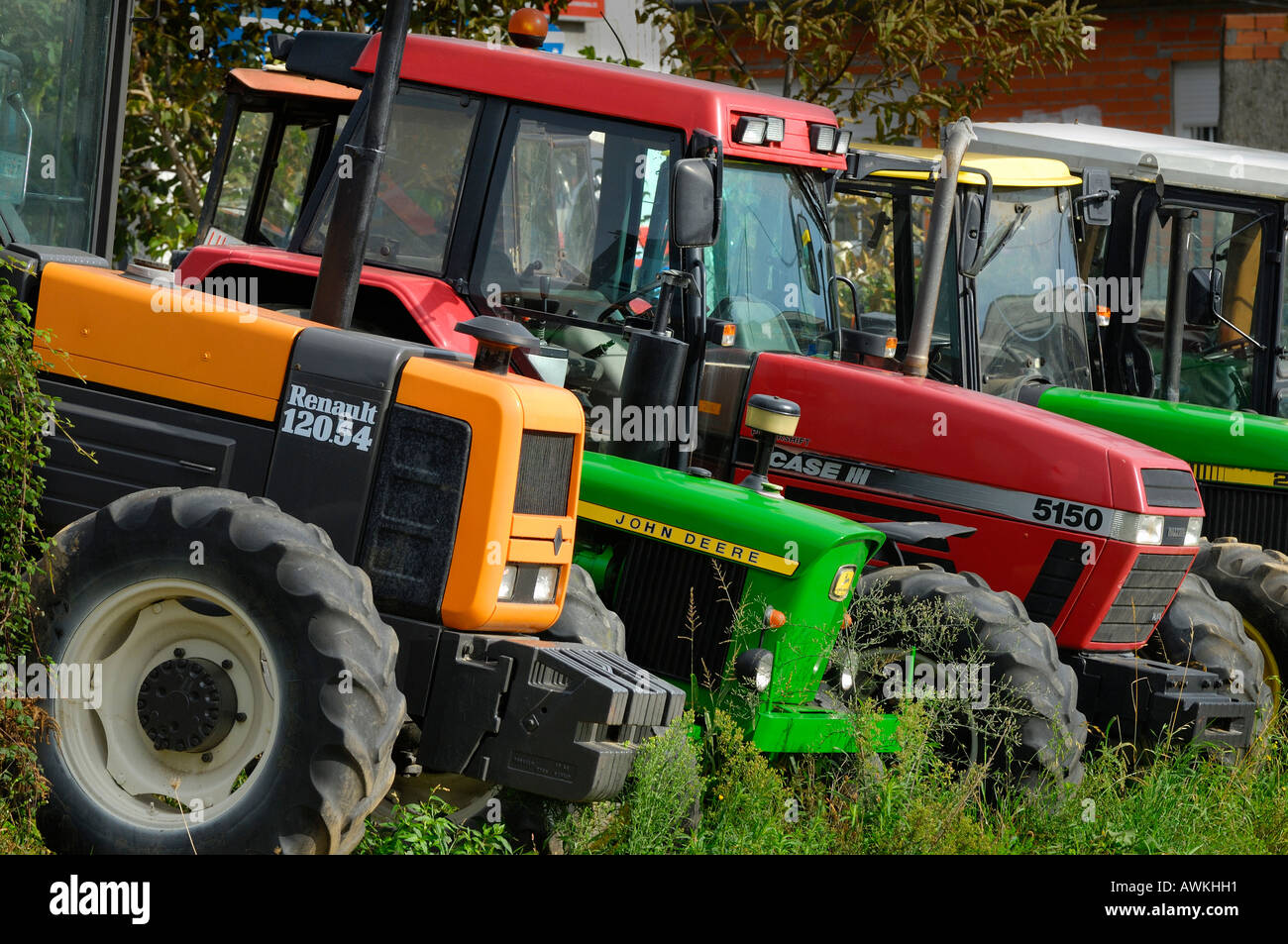 TRACTORS MULTI COLORED Stock Photo - Alamy