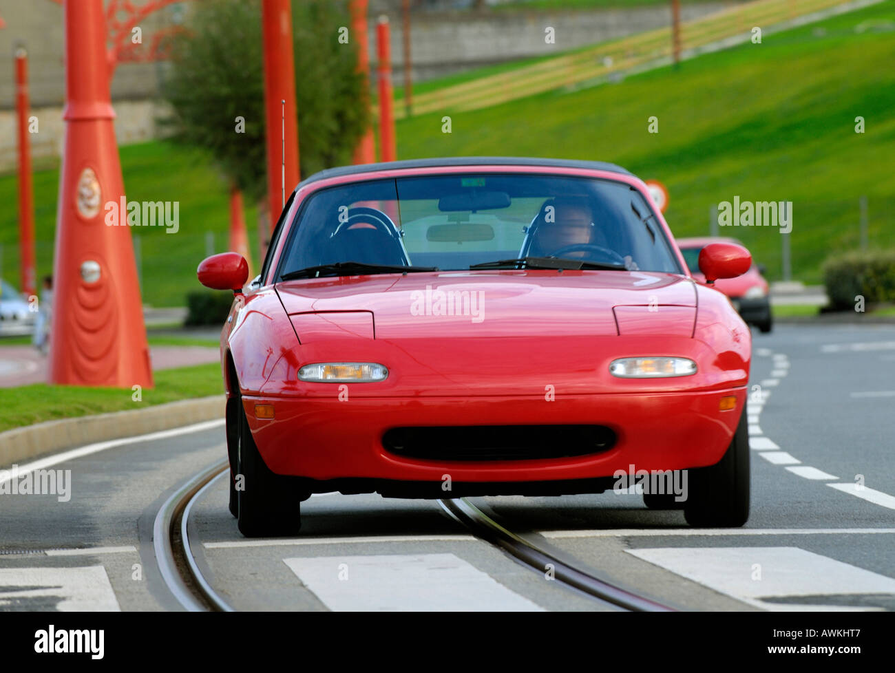 AUTO CAR RED SPORTS CAR TRAVELLING FAST ON ROAD Stock Photo - Alamy