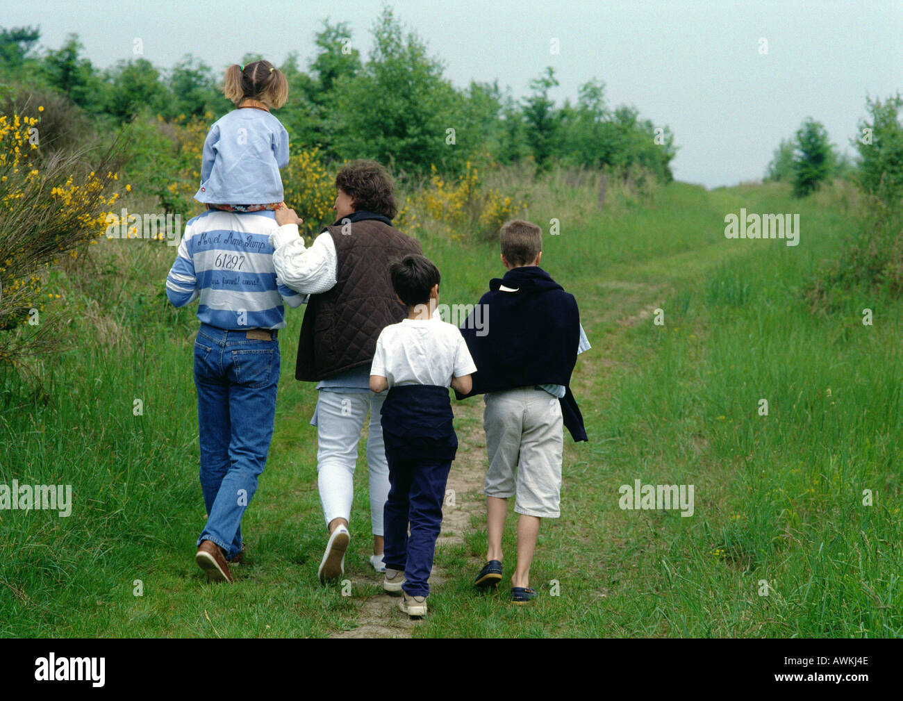 Woman and young daughters and rear view hi-res stock photography and ...