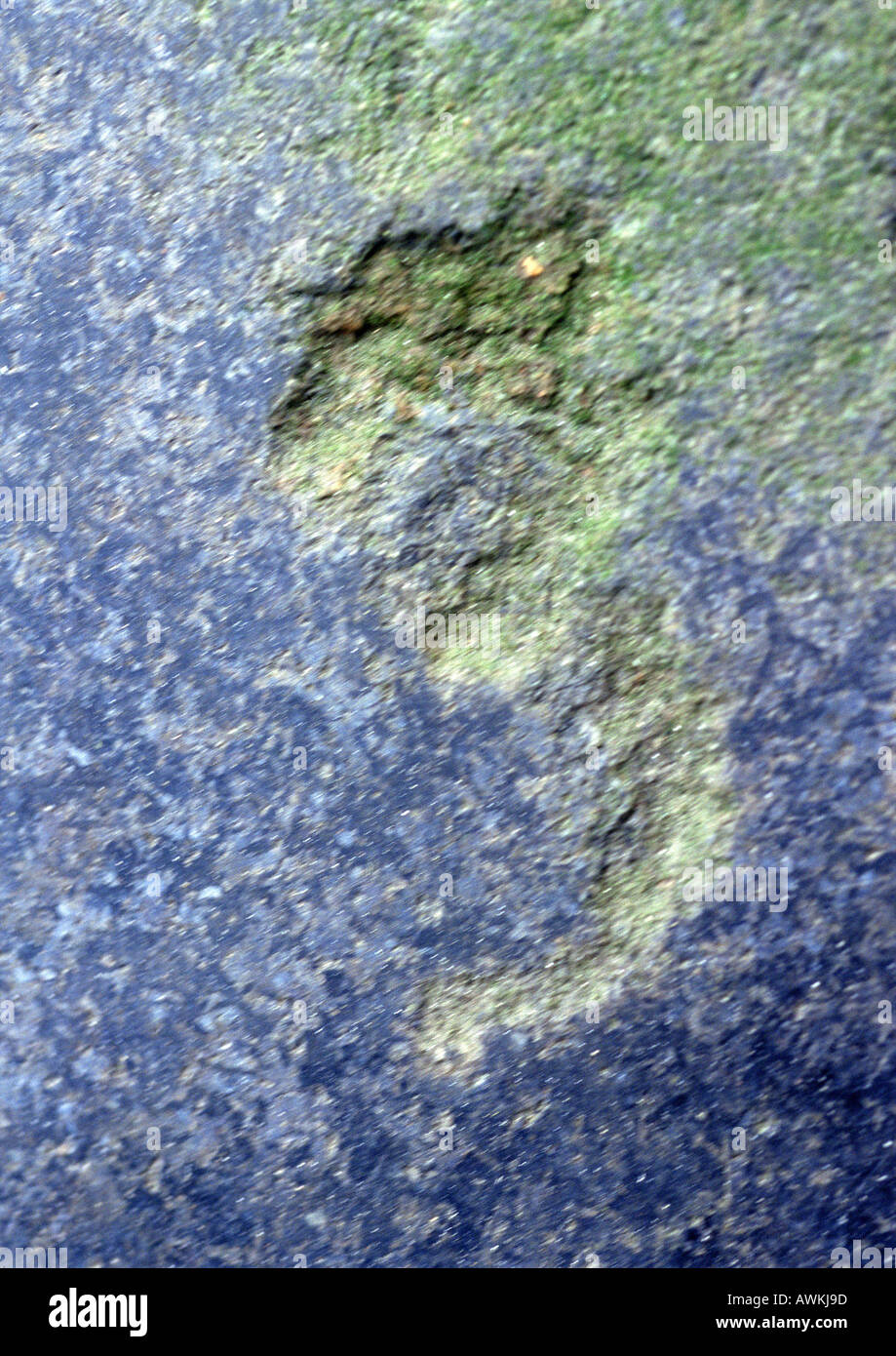 3 text etched in stone Stock Photo - Alamy