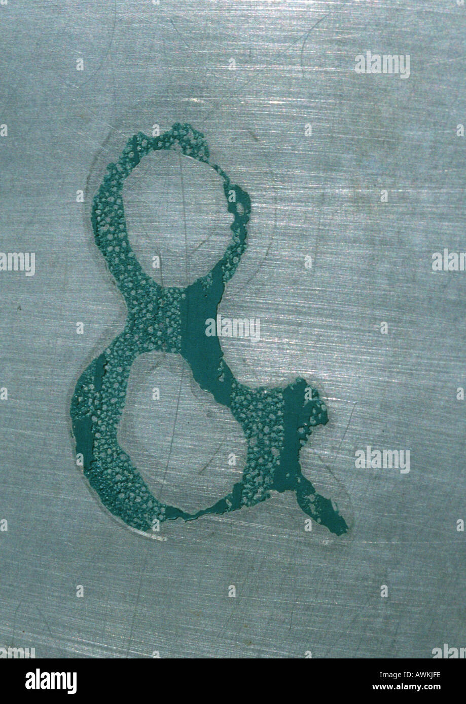 & text, chipped away on metal surface Stock Photo - Alamy