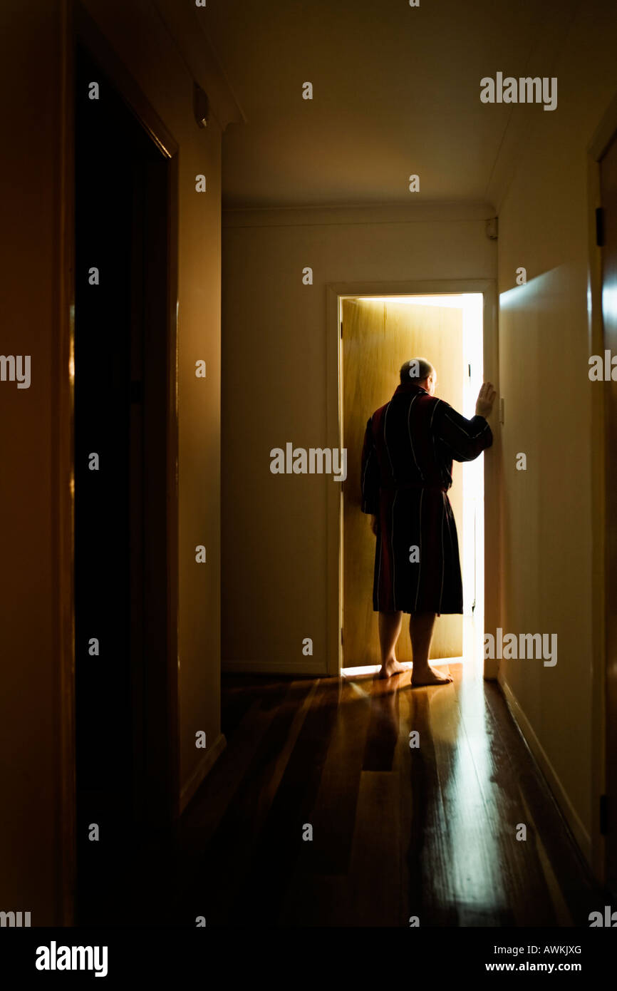 Man dressing gown door hi-res stock photography and images - Alamy