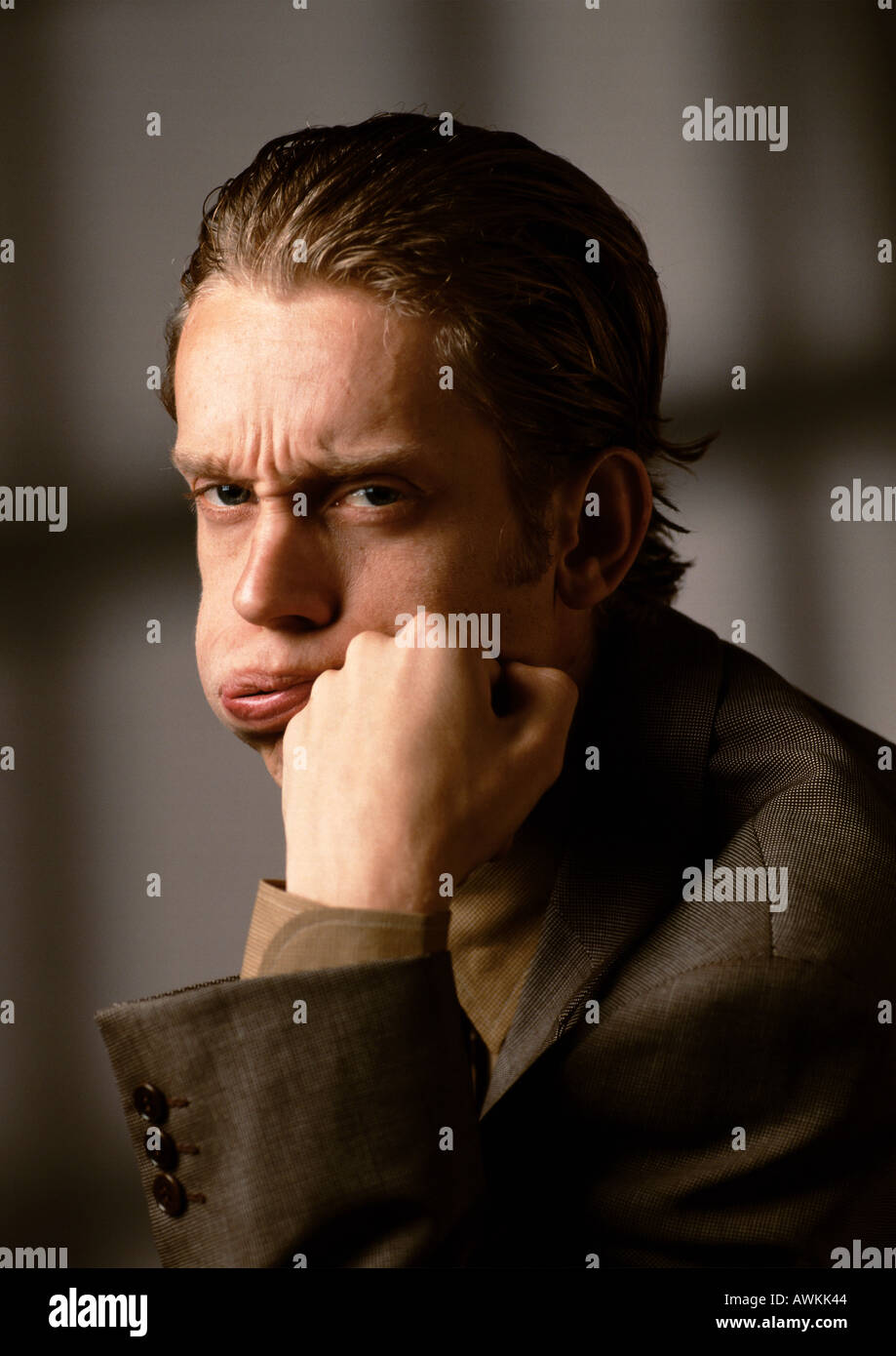 Puffing out cheeks hi-res stock photography and images - Alamy