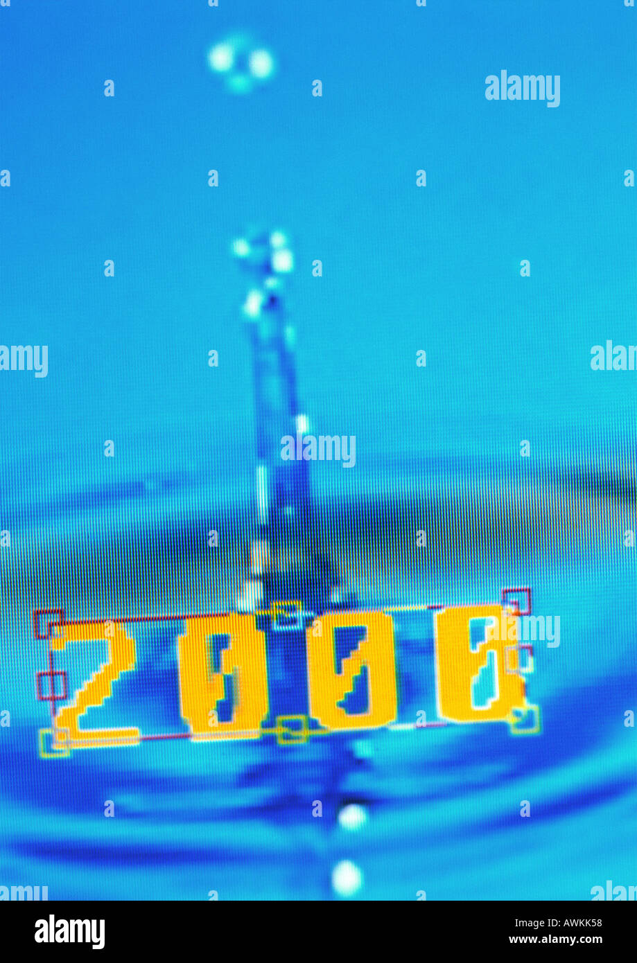 2000, text and drop falling into water Stock Photo - Alamy