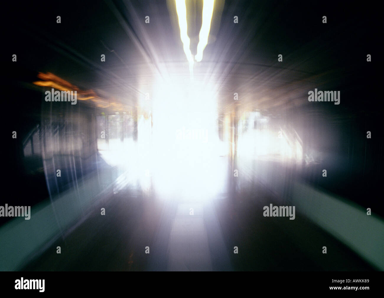 Tunnel with light, blurry Stock Photo - Alamy