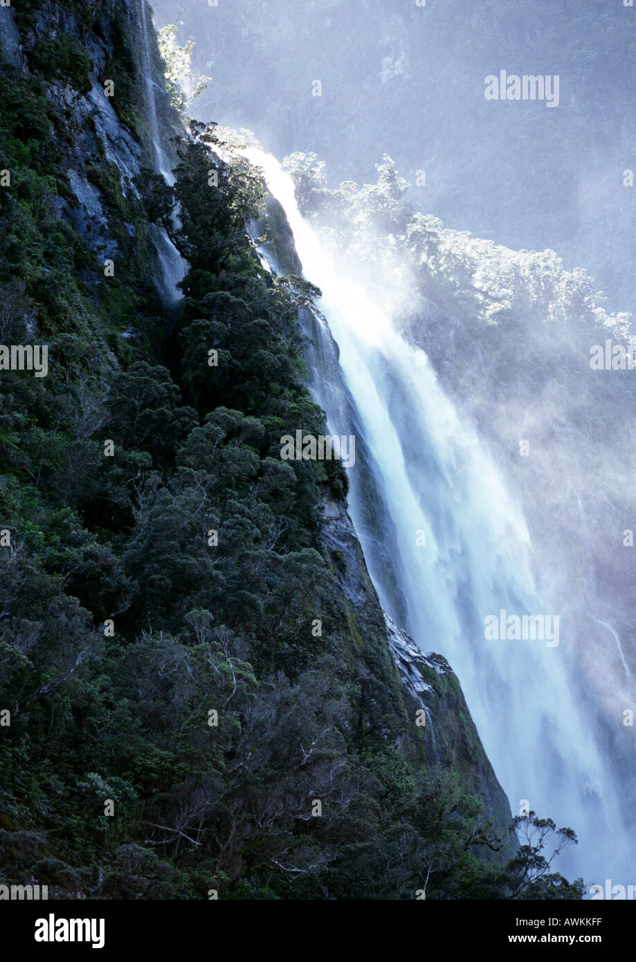 New Zealand, waterfall over cliff Stock Photo - Alamy