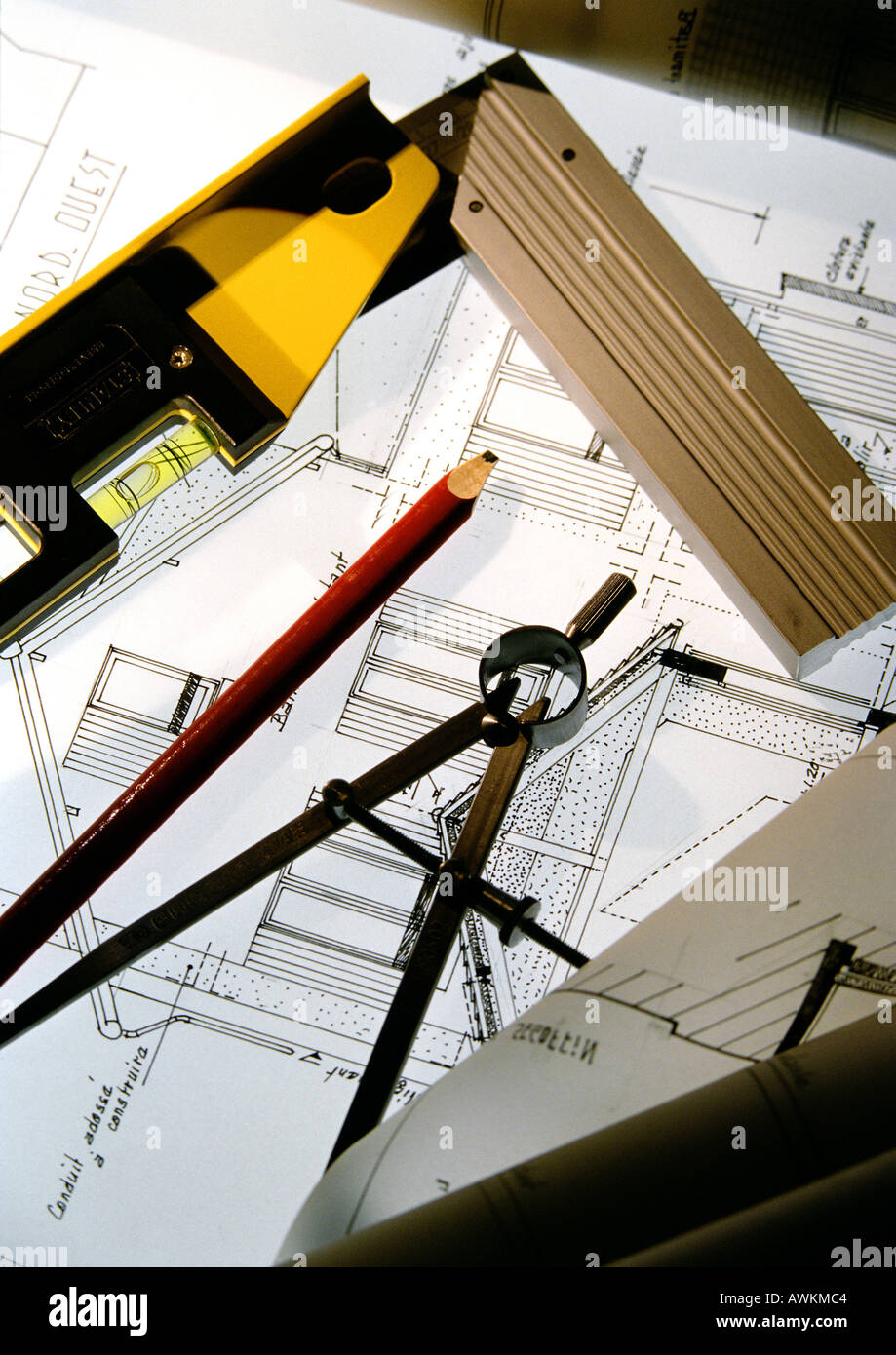 Compass, pencil and level on blueprints, close up Stock Photo - Alamy