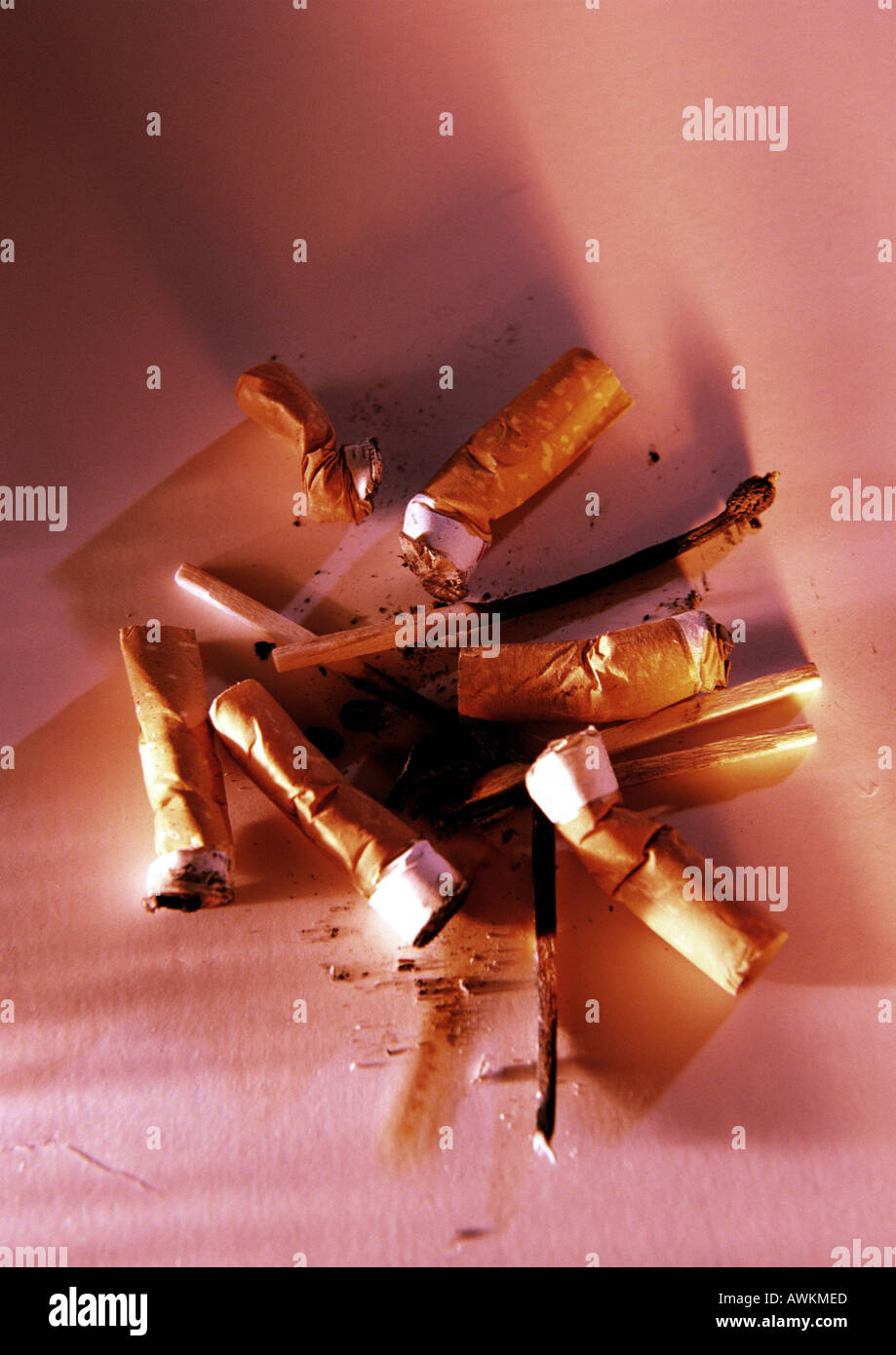 Cigarette butts and used matches Stock Photo - Alamy