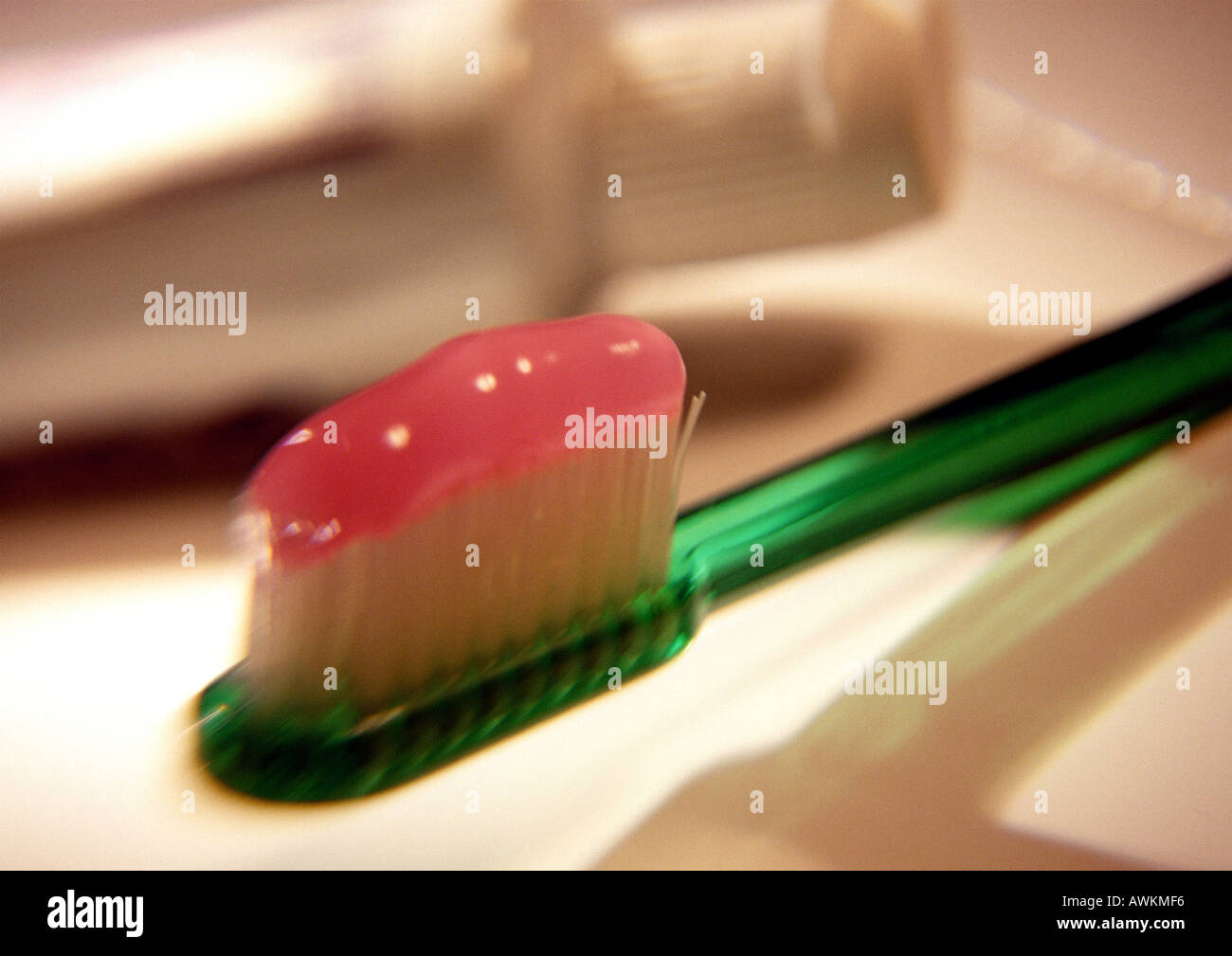 Toothpaste on toothbrush head, close-up Stock Photo - Alamy