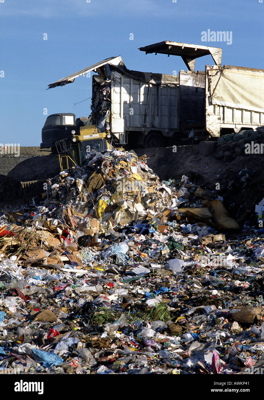 Truck dumping trash in landfill Stock Photo - Alamy