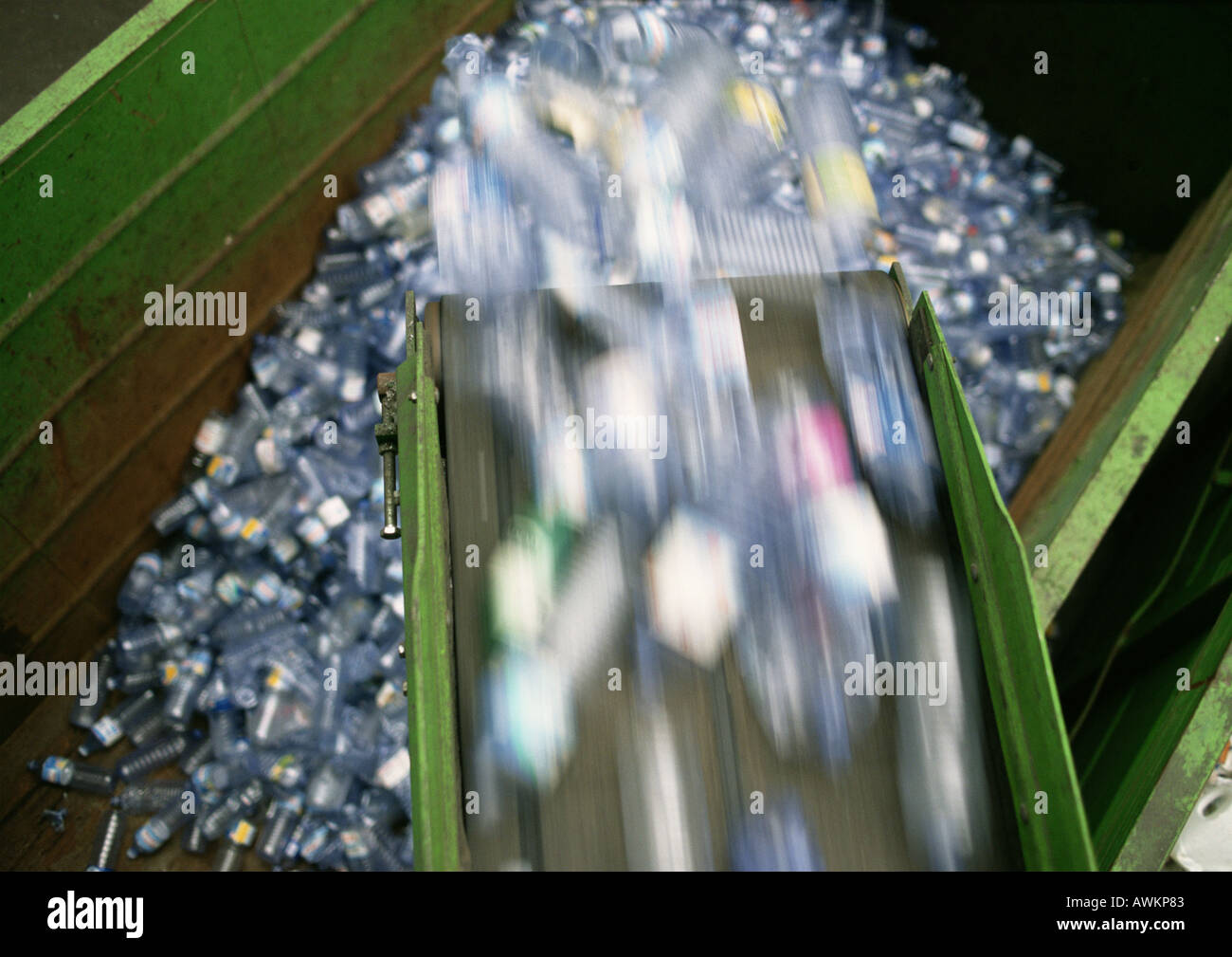 Plastic bottles being sorted into large bin Stock Photo - Alamy