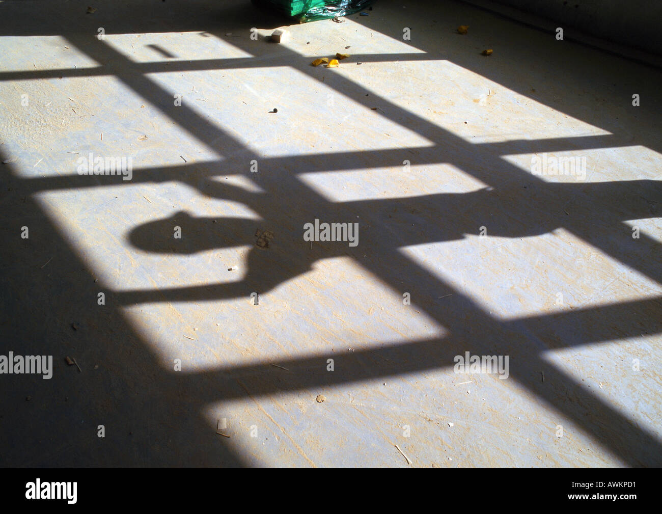 Construction worker's shadow Stock Photo - Alamy