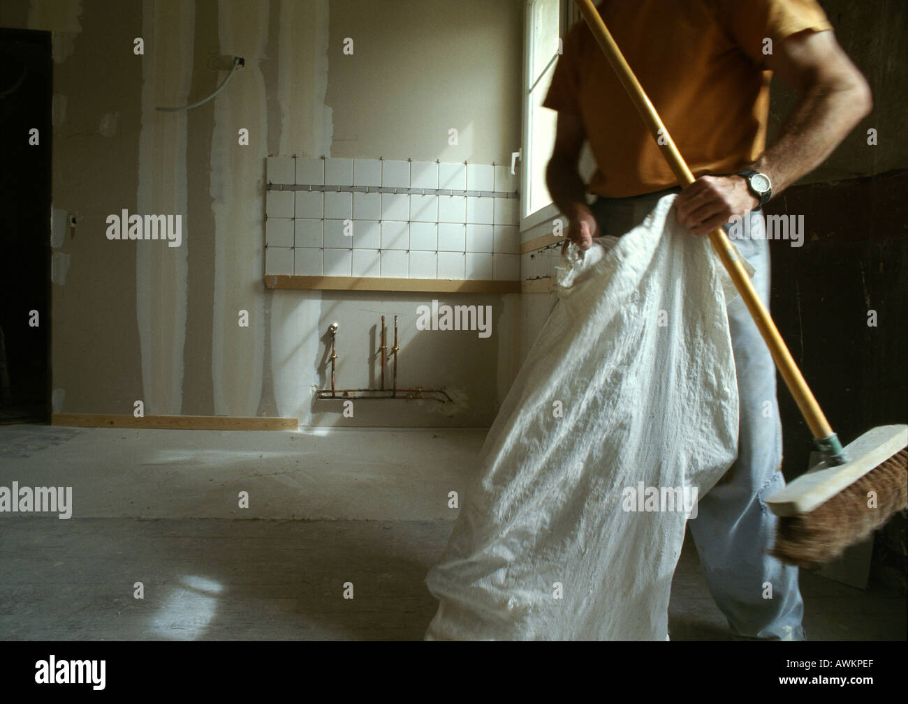 Men Holding Broom High Resolution Stock Photography and Images - Alamy