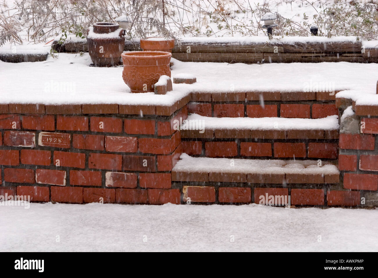 Snow Falling on Brick Steps Stock Photo - Alamy