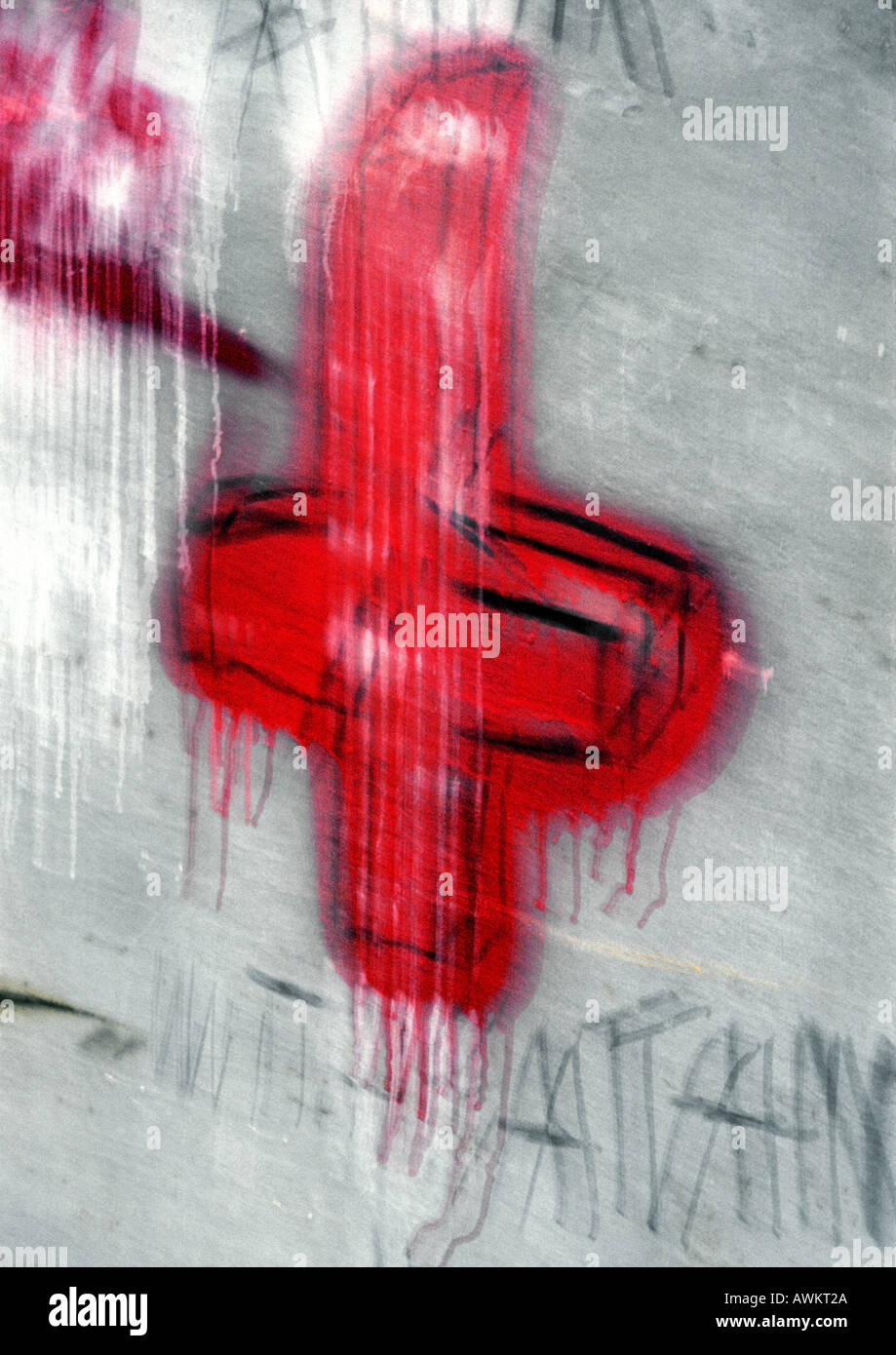 Cross painted on wall, blurred Stock Photo - Alamy