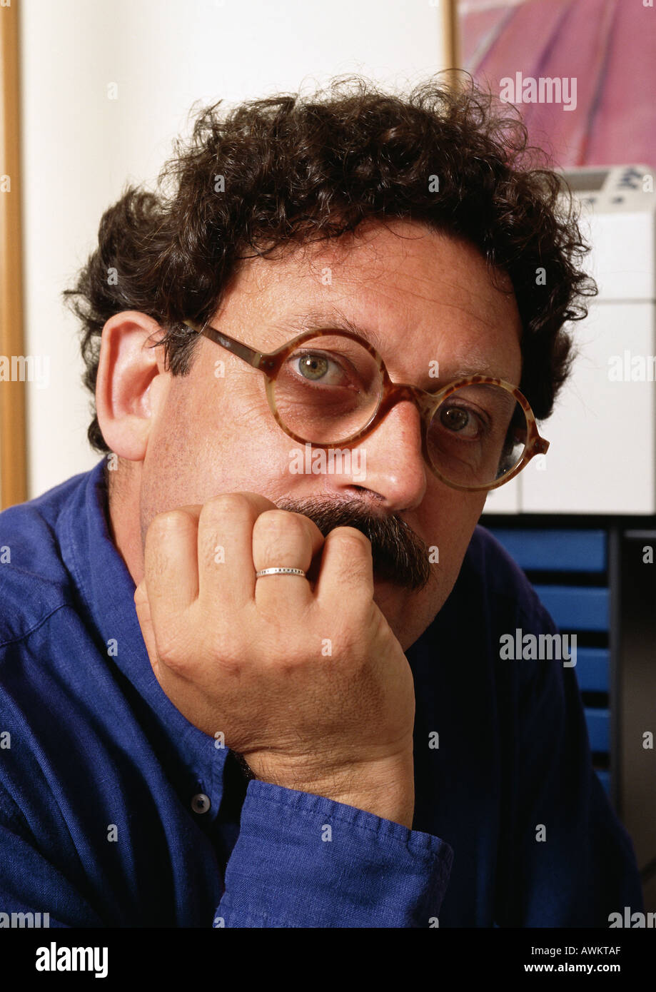 Man, hand under chin, portrait Stock Photo - Alamy