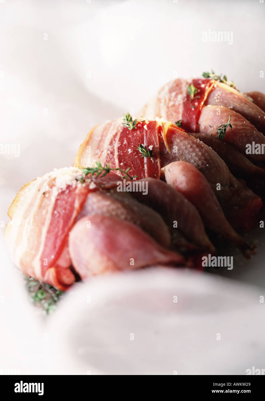 Whole quail wrapped in bacon hi-res stock photography and images - Alamy