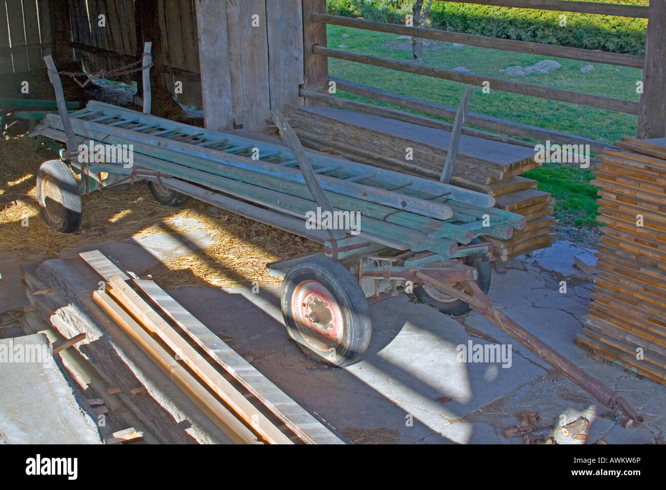 Old rustic farm cart under the barn Stock Photo - Alamy