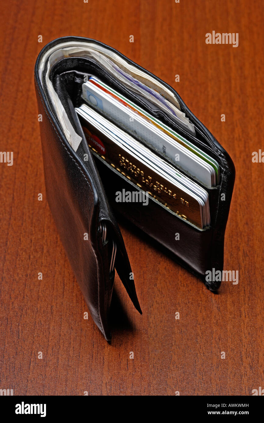 Fat wallet hi-res stock photography and images - Alamy