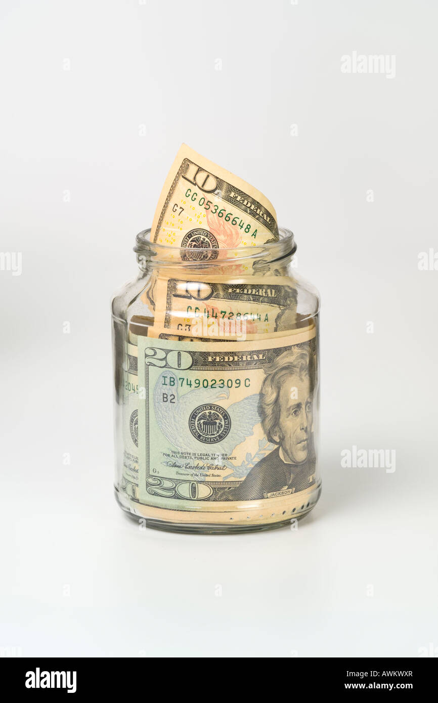 American Dollar bills in glass jar Stock Photo - Alamy