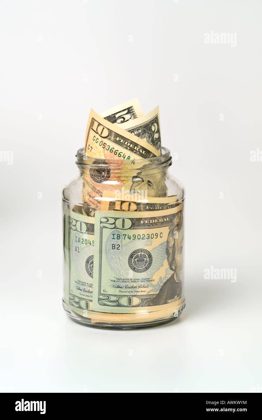 American Dollar bills in glass jar Stock Photo - Alamy