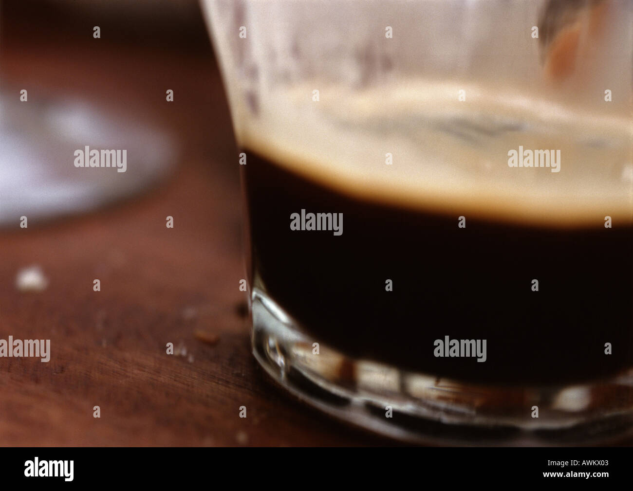 Half-full glass of coffee, close-up Stock Photo - Alamy