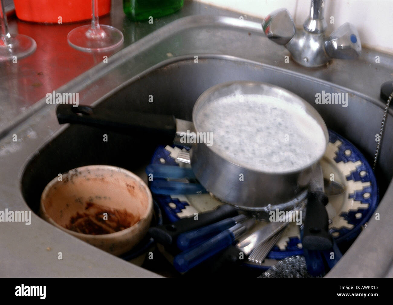 Dirty dishes in sink Stock Photo - Alamy