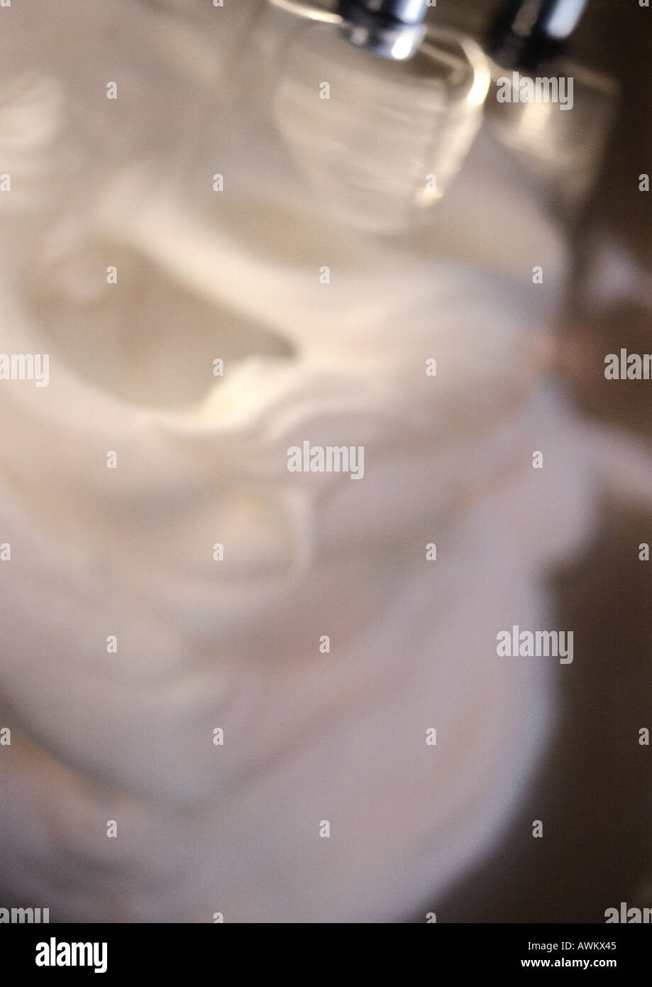 Electric mixer beating egg whites, close-up, blurred Stock Photo - Alamy