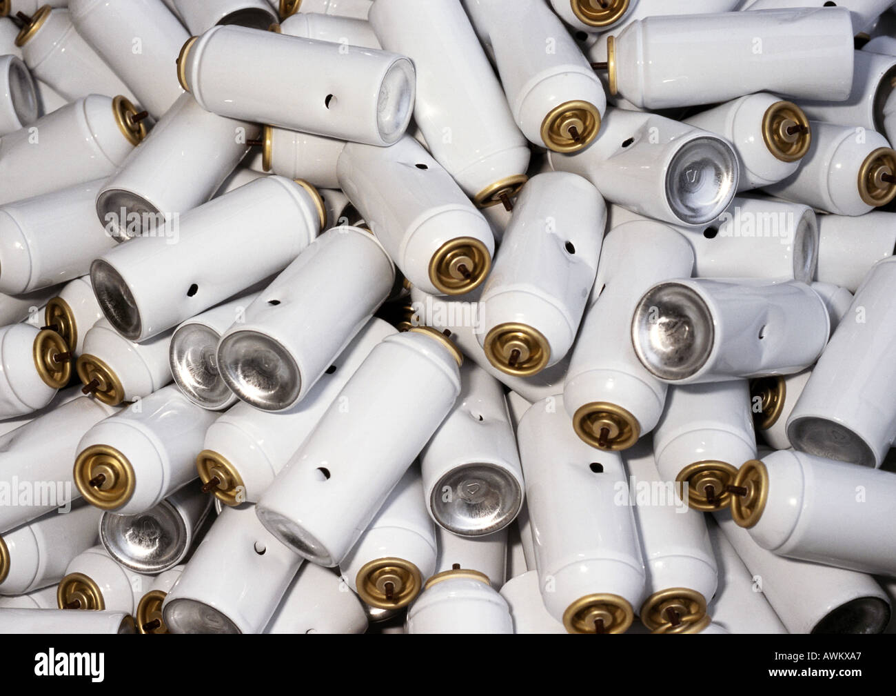 Heap of white, punctured aerosol cans, close-up, full frame Stock Photo ...