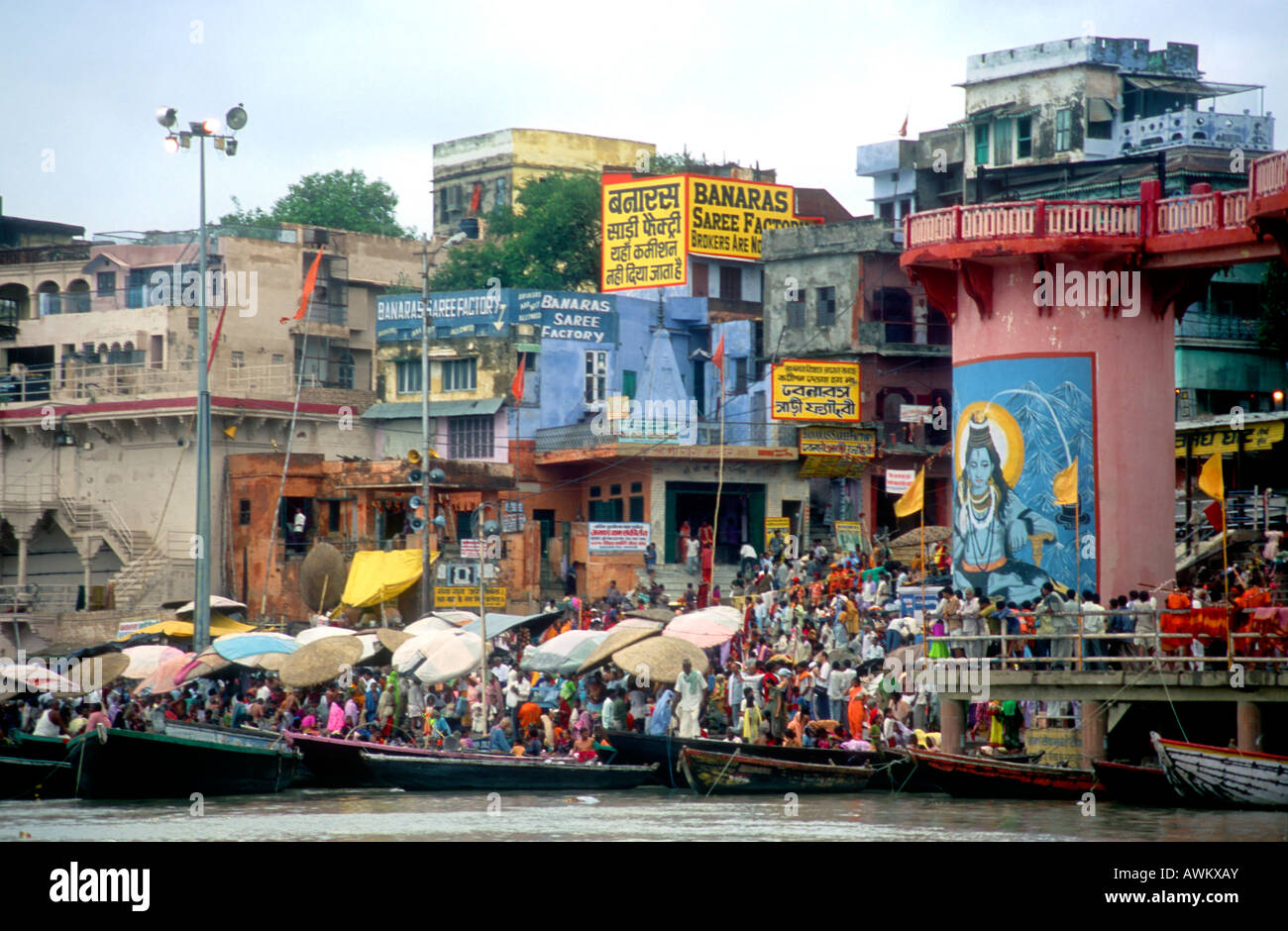 Morning gathering of locals at Prayag Ghat on the bank of the river ...