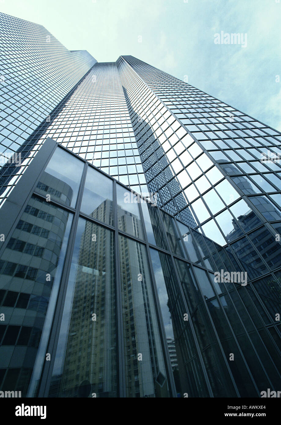 Skyscraper, building reflected in window panes, low angle view Stock ...