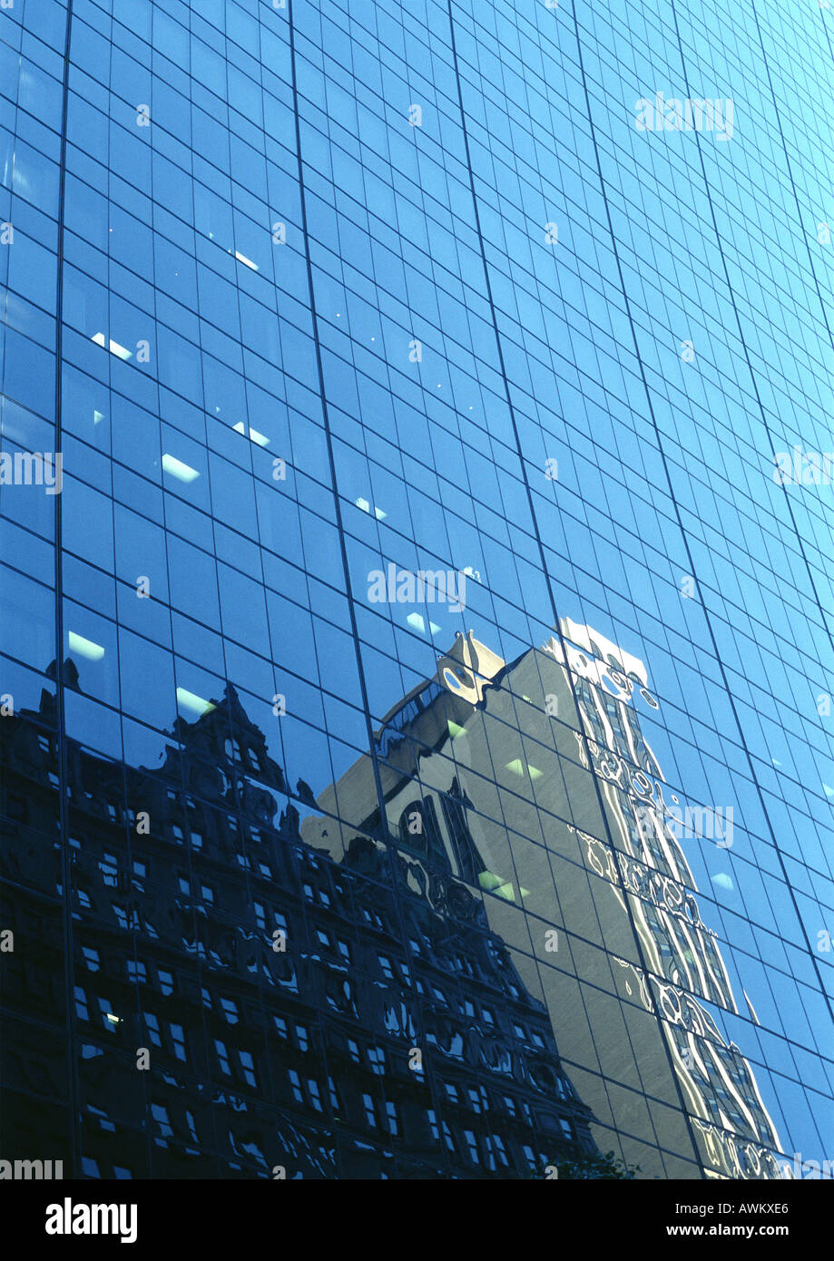 Buildings reflected in window panes of skyscraper Stock Photo - Alamy