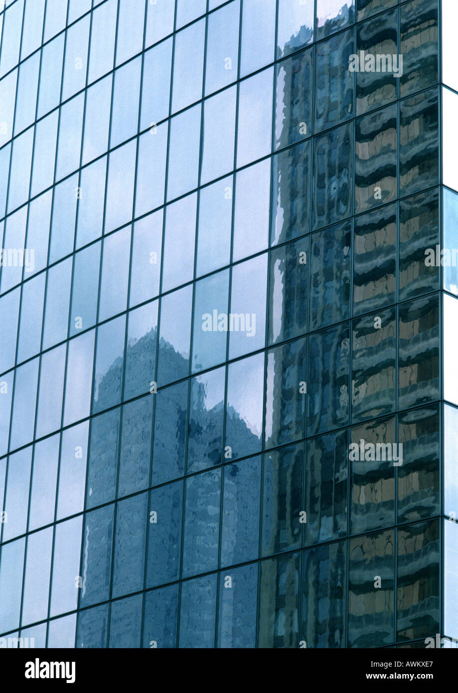 One person reflected in building window hi-res stock photography and ...