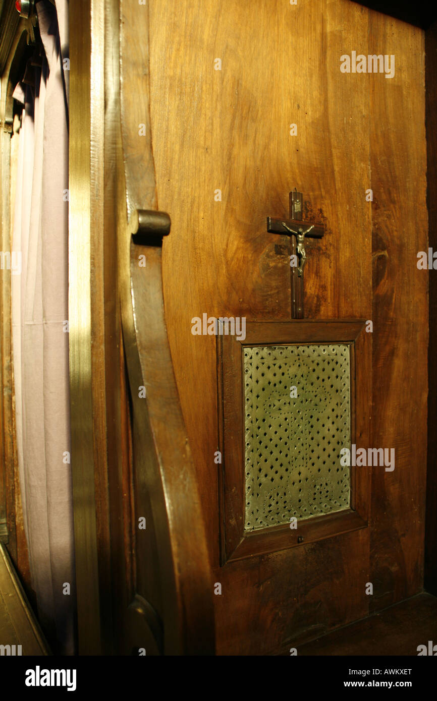 Man in church confession box hi-res stock photography and images - Alamy