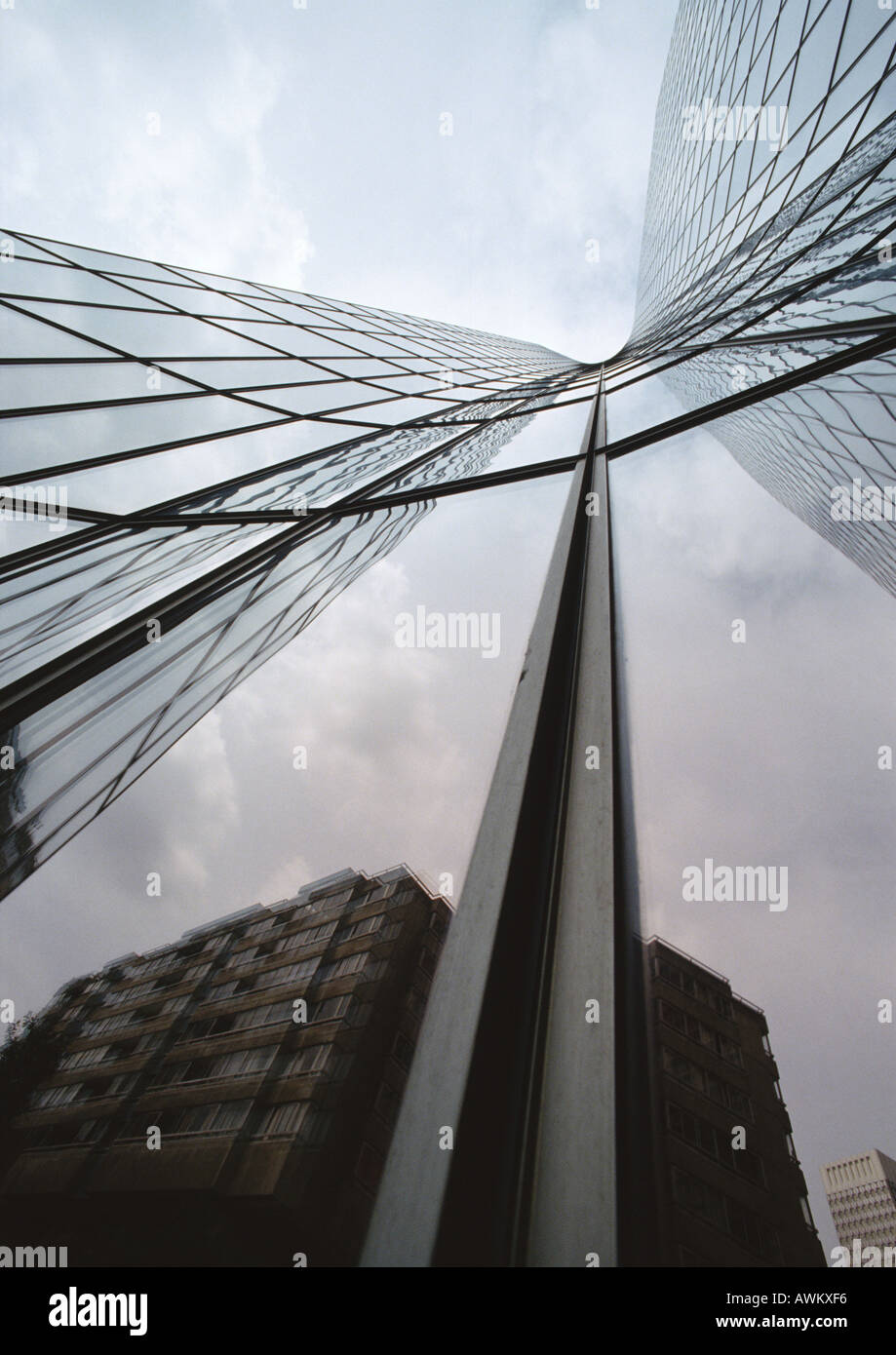 One person reflected in building window hi-res stock photography and ...