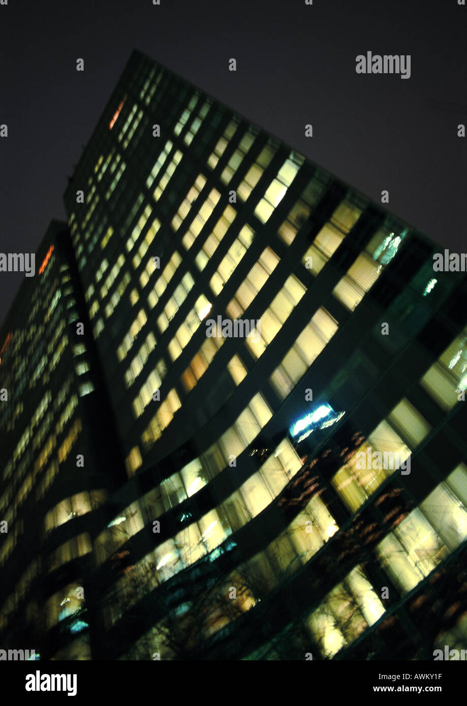 Skyscraper's facade at night, low angle view Stock Photo - Alamy