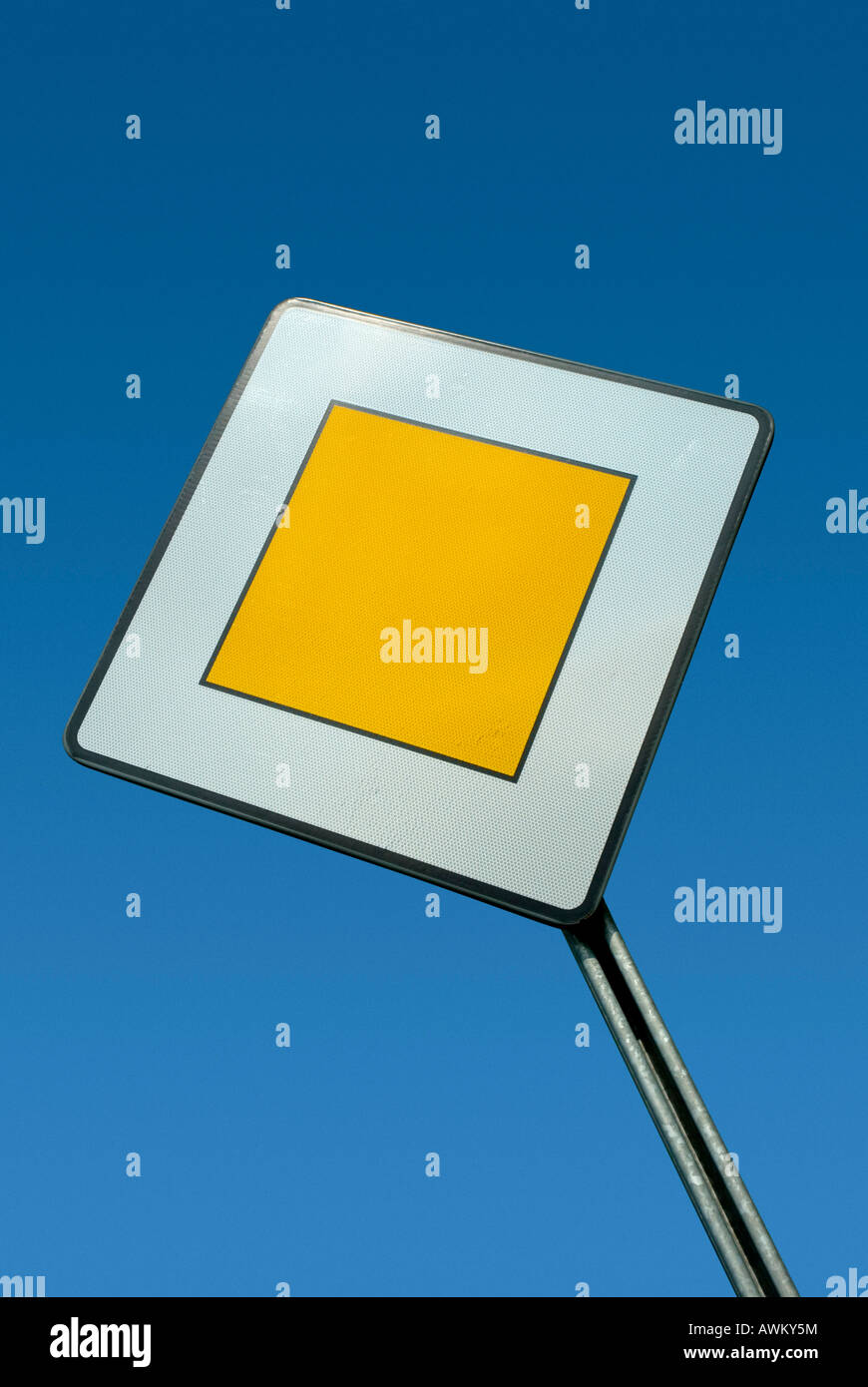 PRIORITY ROAD TRAFFIC SIGN ON BLUE SKY Stock Photo - Alamy