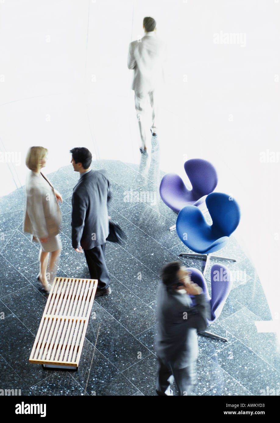 Business people standing in lobby, elevated view Stock Photo - Alamy