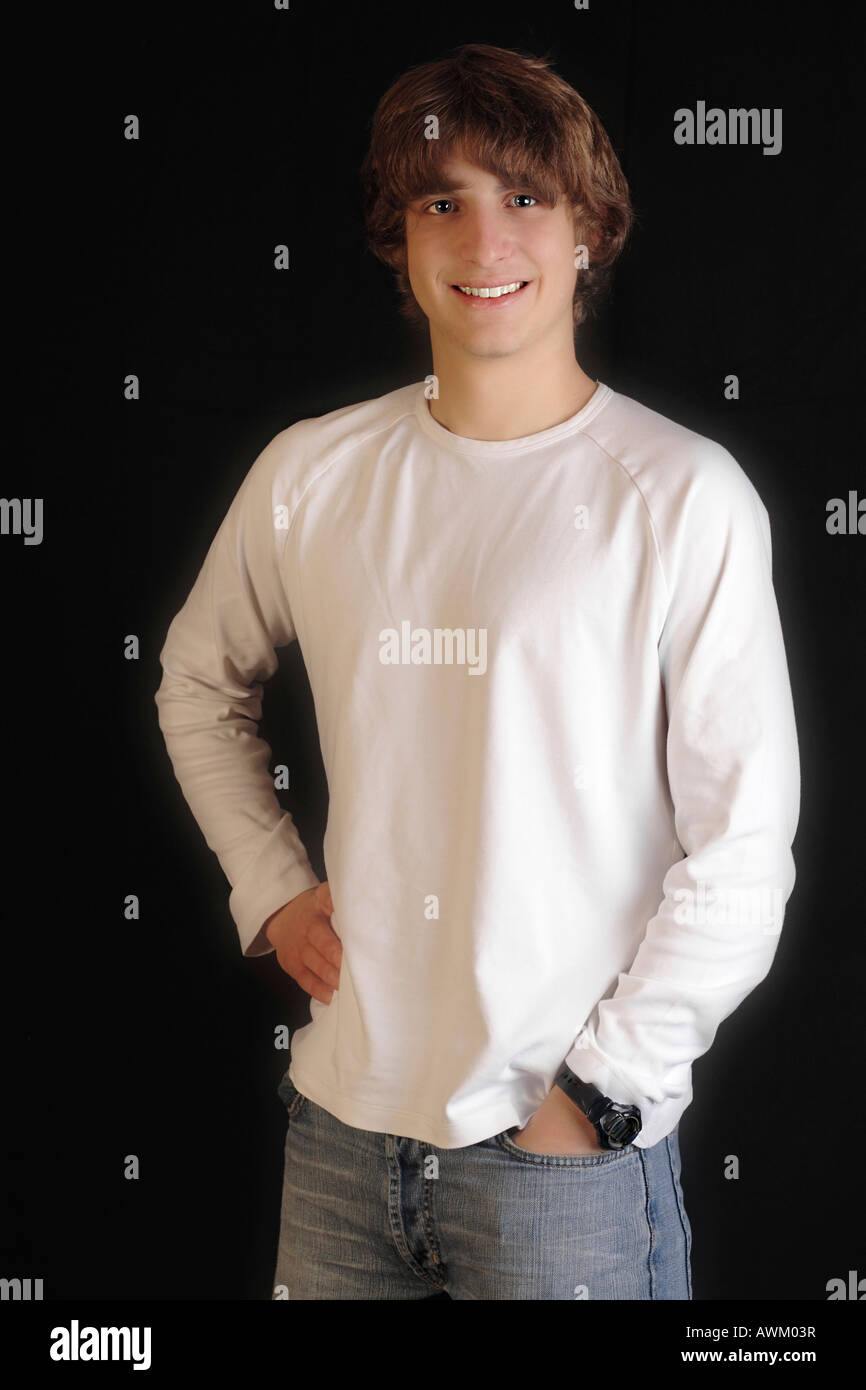 Young man standing relaxed Stock Photo - Alamy Young man standing relaxed Stock Photo - Alamy