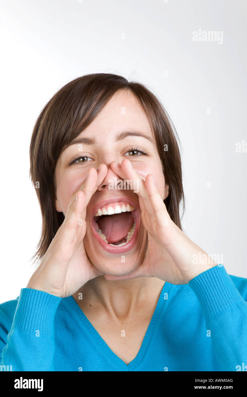 Young woman shouting Stock Photo - Alamy