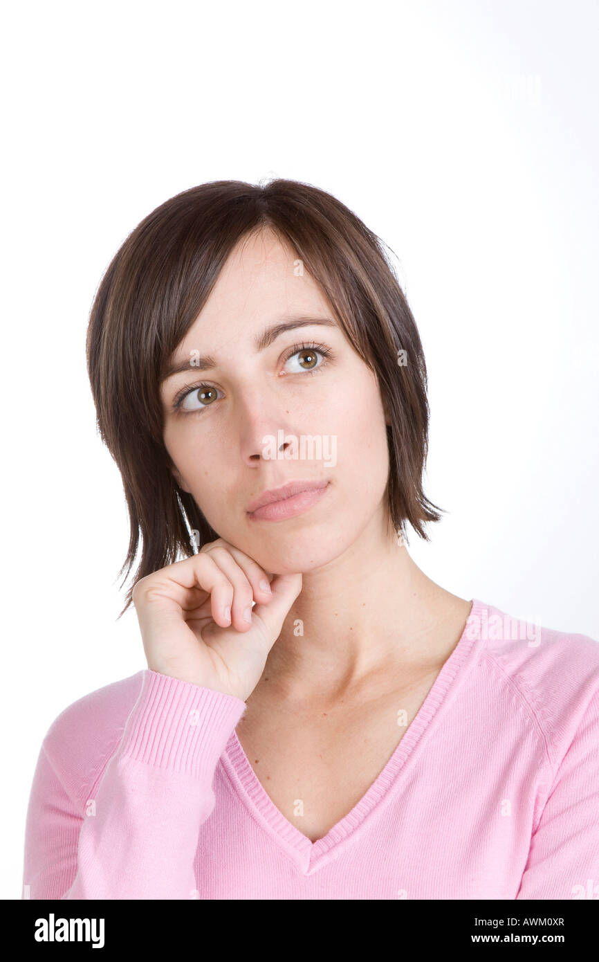 Contemplative young woman Stock Photo - Alamy
