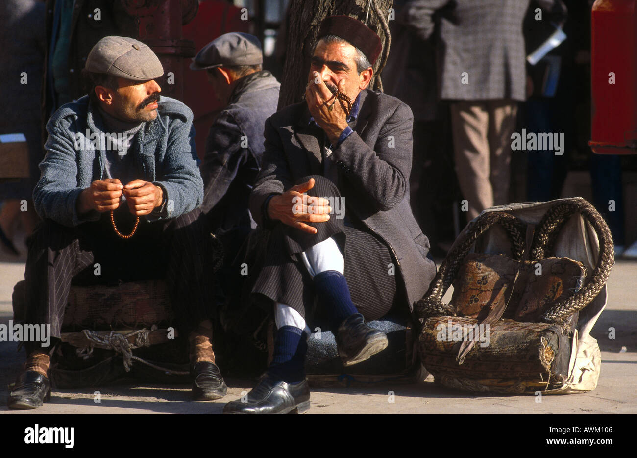 Two male carriers waiting for customers and talking Istanbul Turkey ...