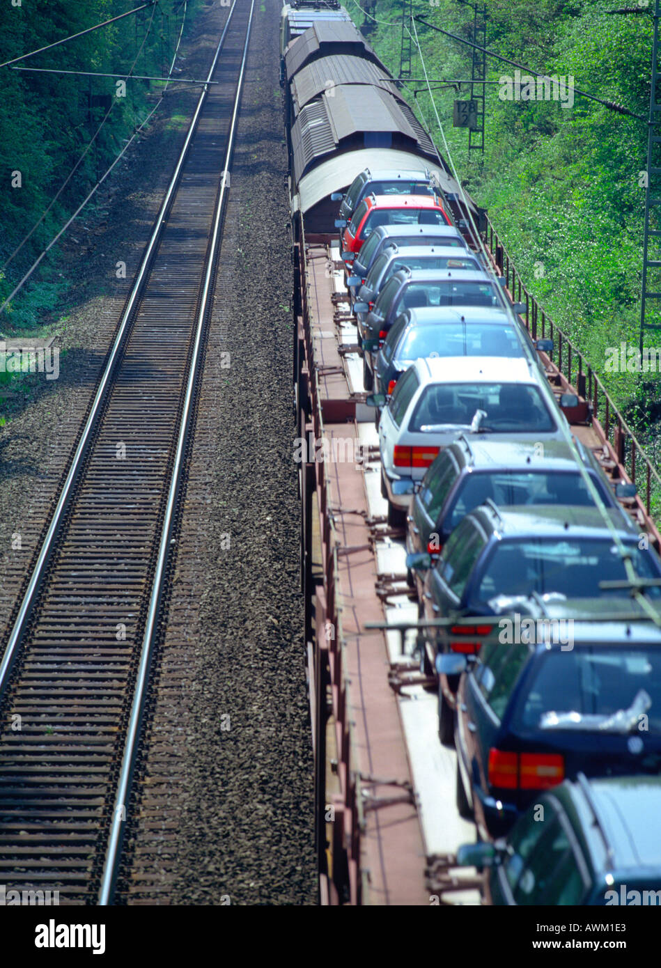 Freight train transporting cars Stock Photo - Alamy